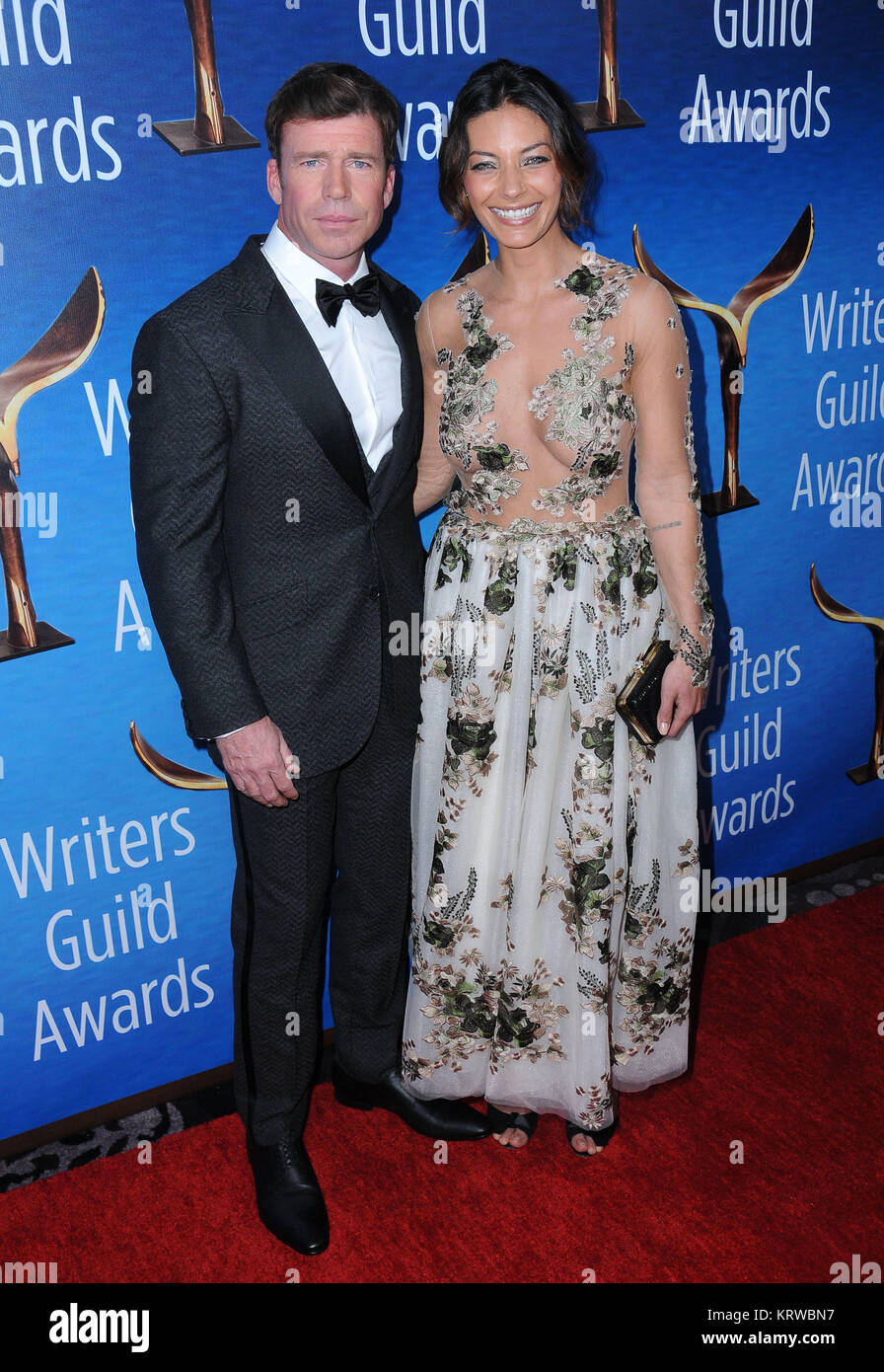 BEVERLY HILLS, CA - FEBRUARY 19: (L-R) Writer Taylor Sheridan and guest ...