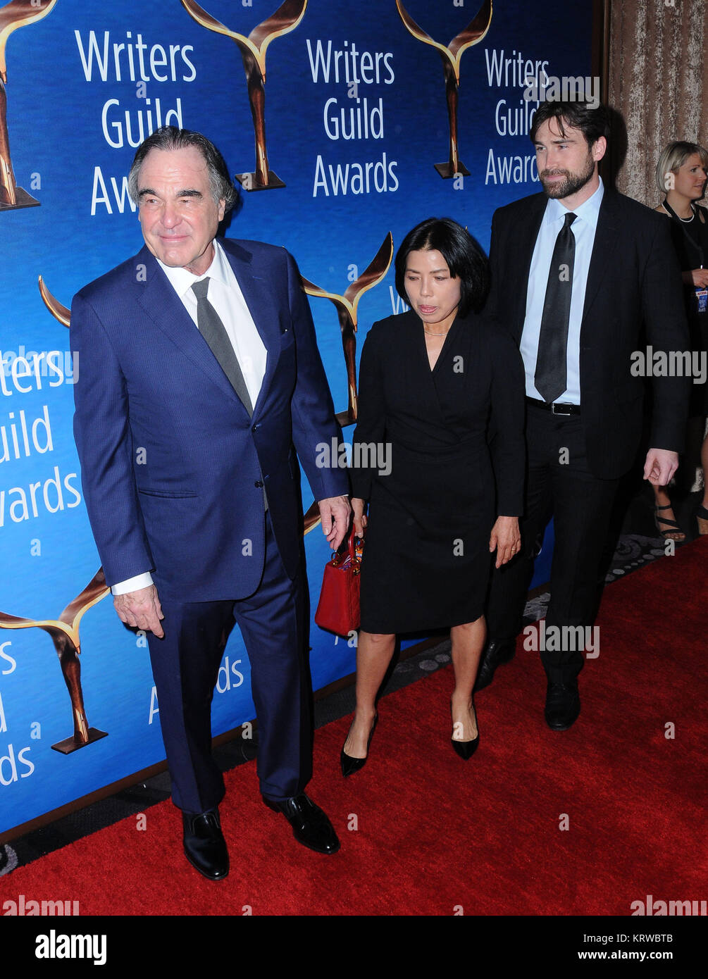 BEVERLY HILLS, CA - FEBRUARY 19: Director Oliver Stone (L) and family ...