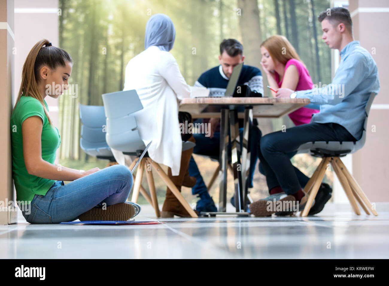 startup business people group working as team to find solution to ...