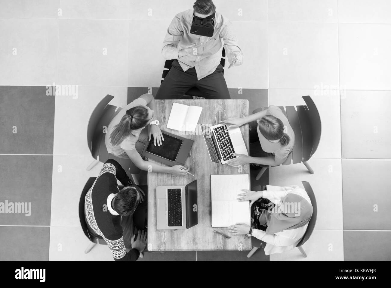 Smiling creative team working Black and White Stock Photos & Images - Alamy