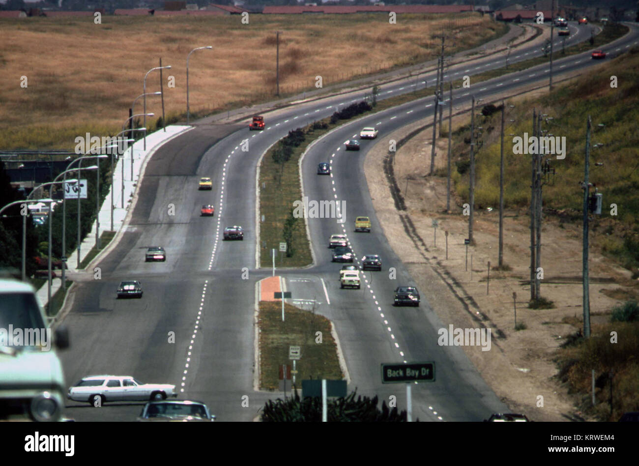 Mid-1970s automobile traffic on a highway near Newport Beach ...