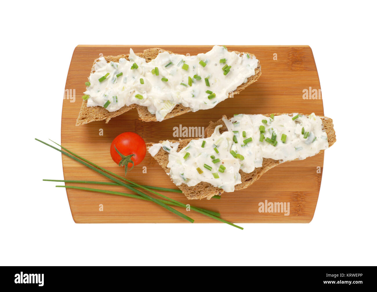 bread roll with cheese spread Stock Photo - Alamy