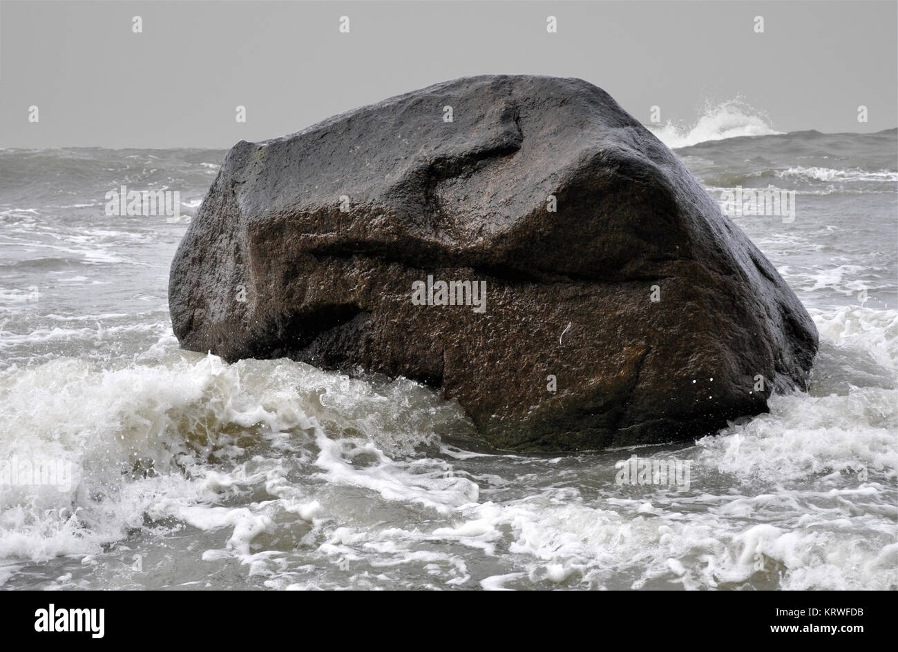 stone in the sea Stock Photo - Alamy