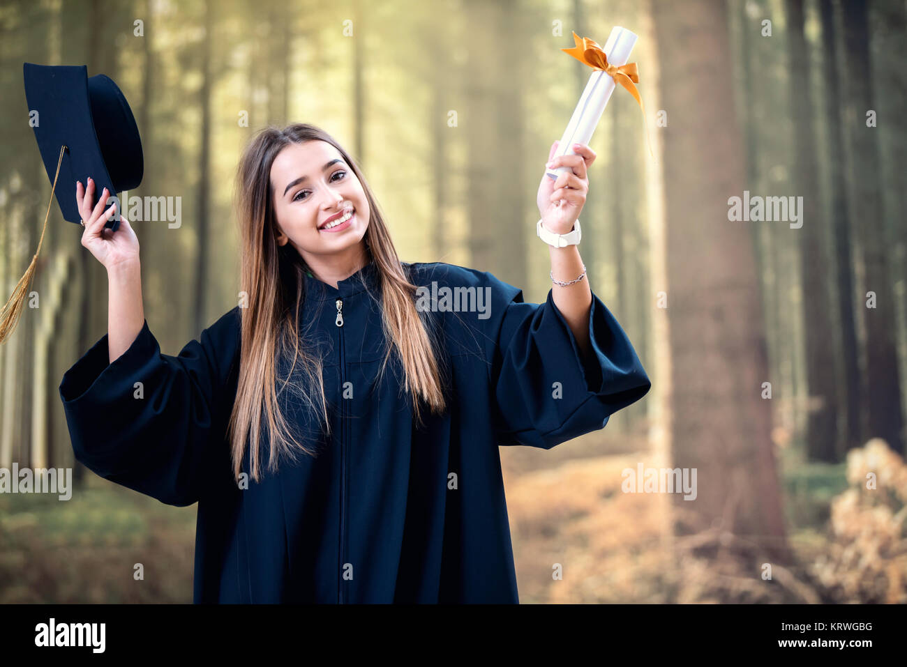 Graduation: Student Standing With Diploma Stock Photo - Alamy