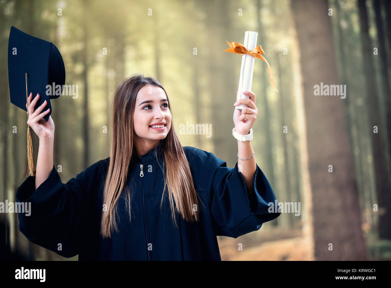 Graduation: Student Standing With Diploma Stock Photo - Alamy