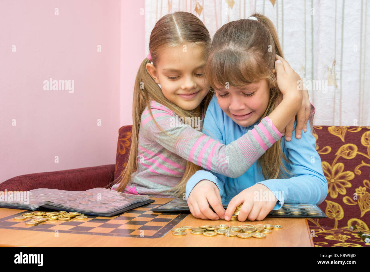 The older sister comforting crying younger sister, which collects a ...