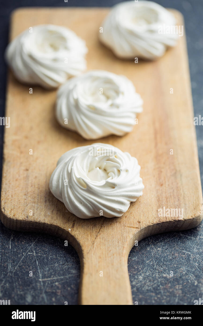 Sweet white meringue Stock Photo - Alamy