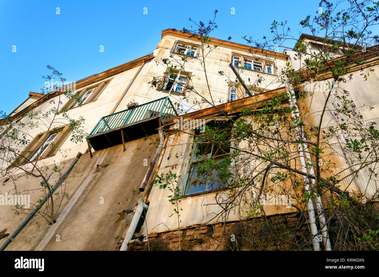 A house as precipitous as the hill Stock Photo - Alamy