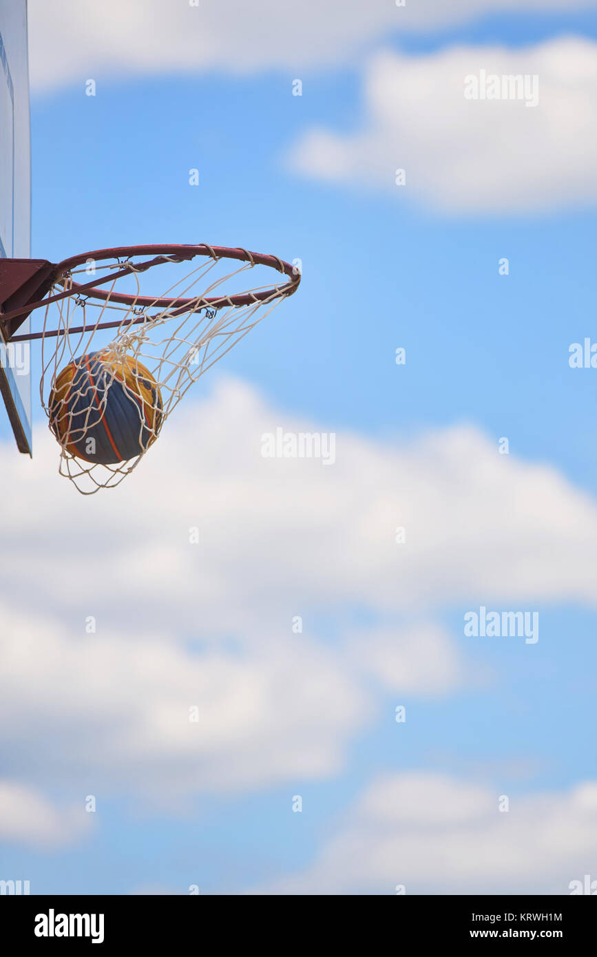 Basketball hoop in sunlight and sky / for goal concept Stock Photo - Alamy