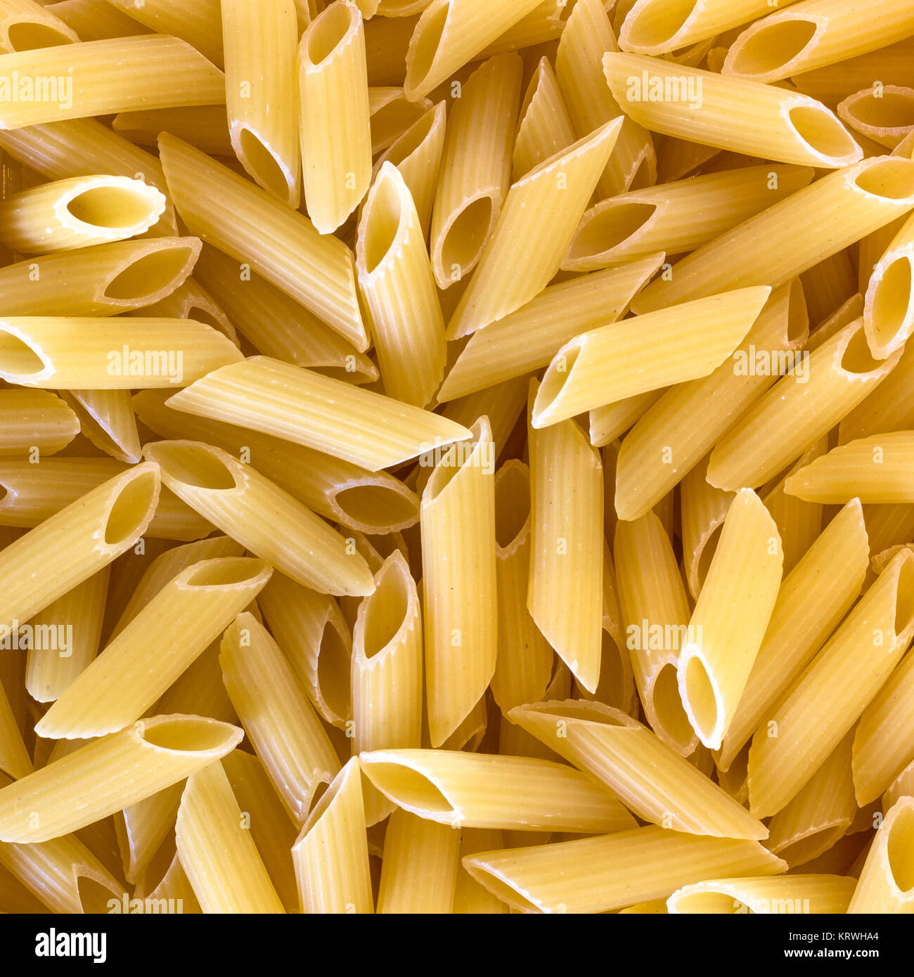 Penne pasta background Stock Photo - Alamy