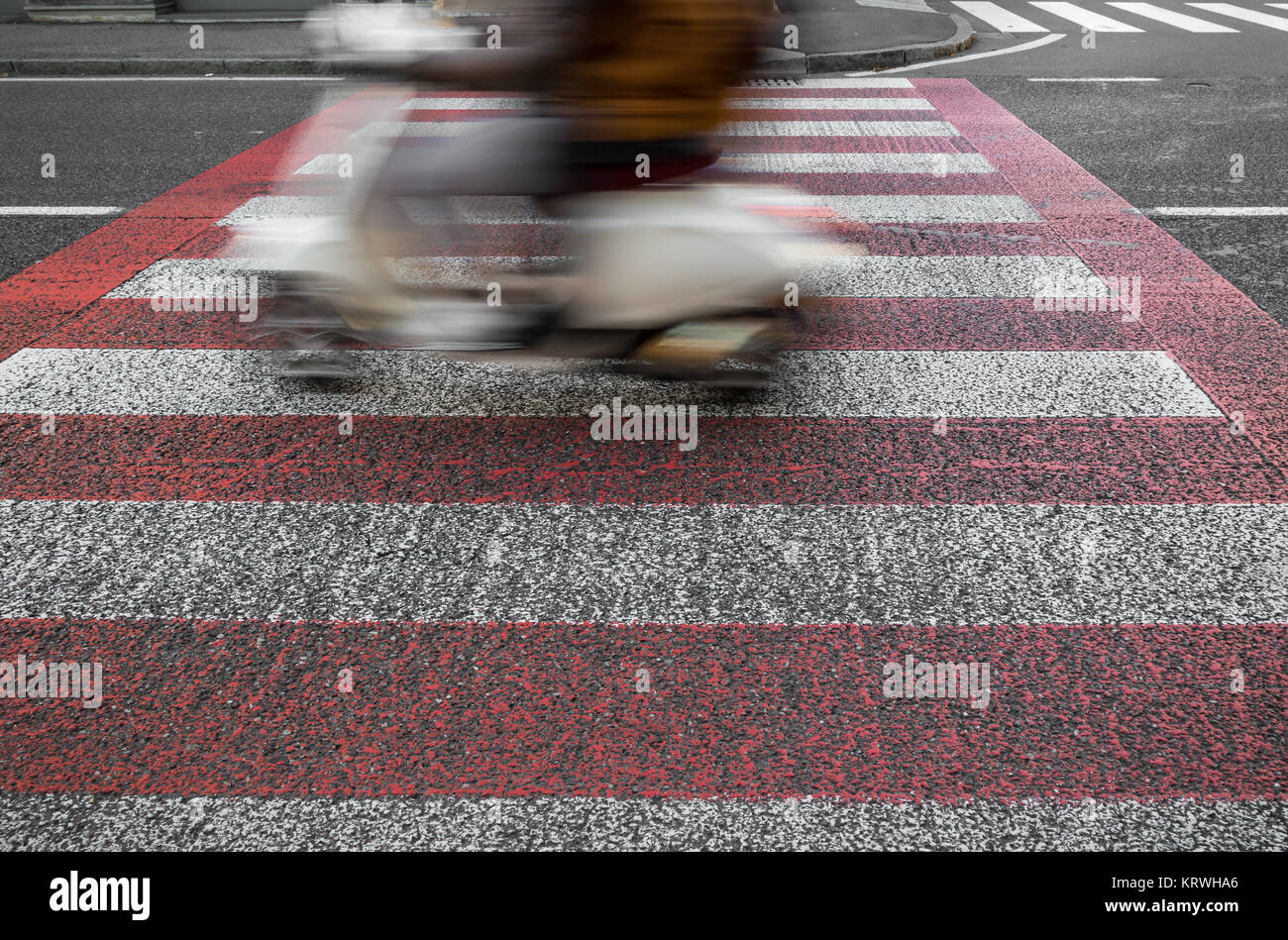 Small motorcycle on road Stock Photo - Alamy