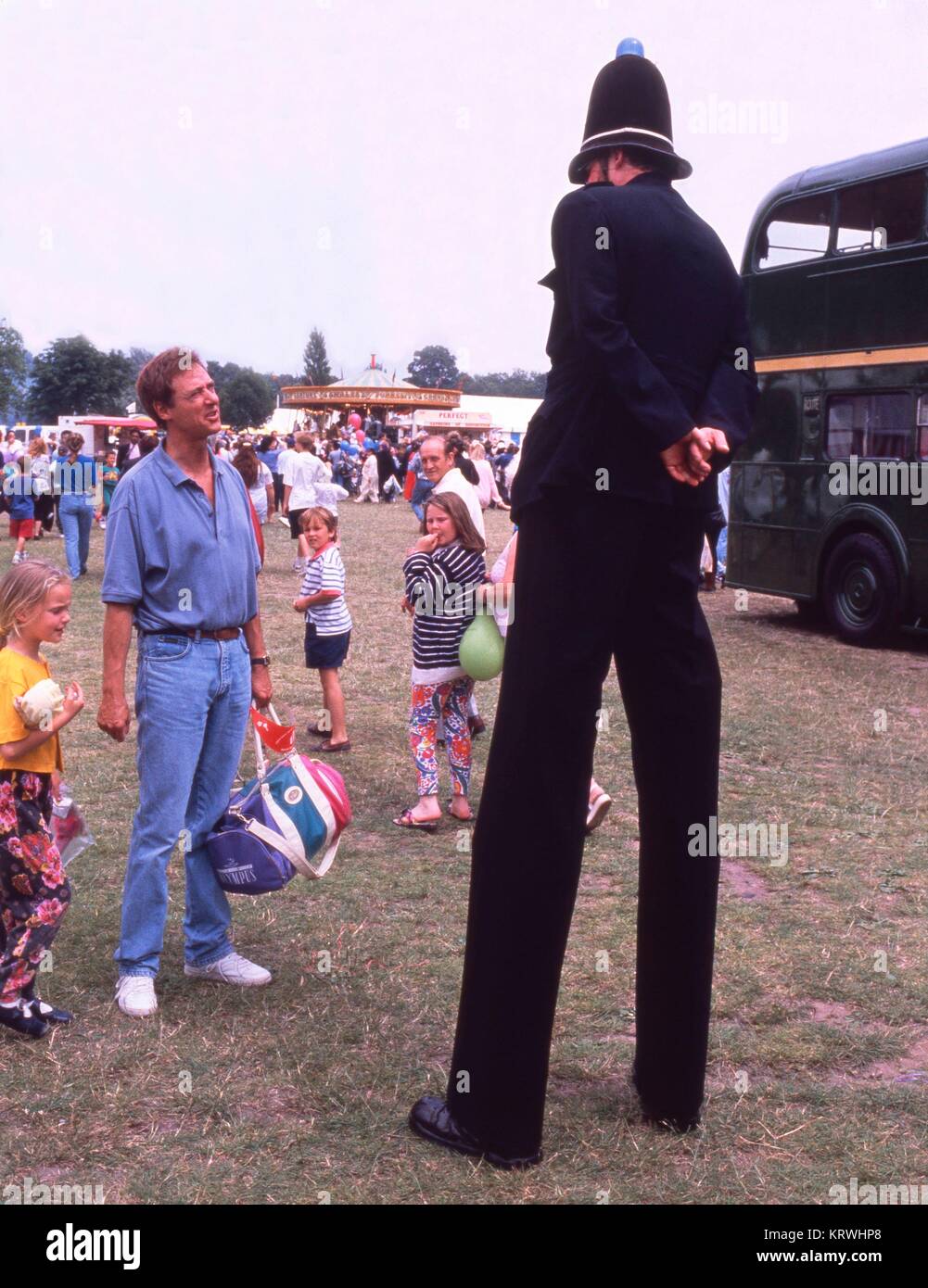Large policeman speaks to man, England, Great Britain Stock Photo - Alamy
