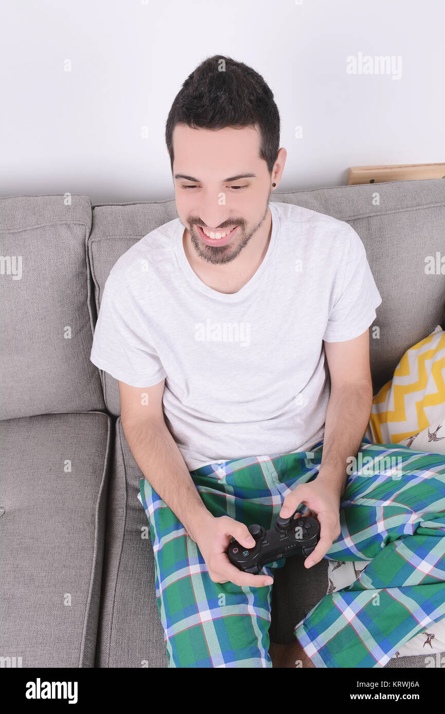 Video game controller couch hi-res stock photography and images - Alamy