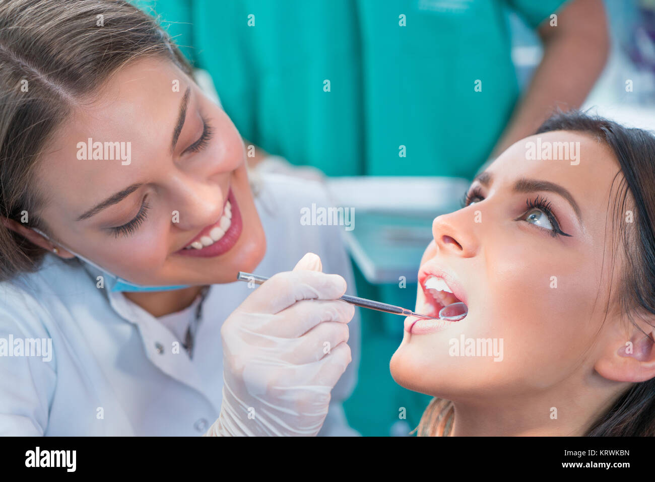 Doctor talking with her patient. Dentist concept Stock Photo - Alamy