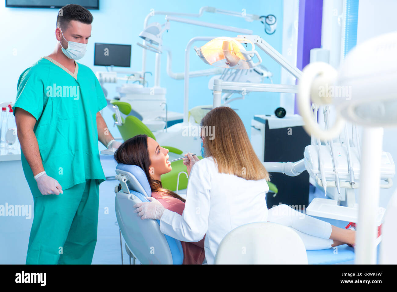 Doctor talking with her patient. Dentist concept Stock Photo - Alamy