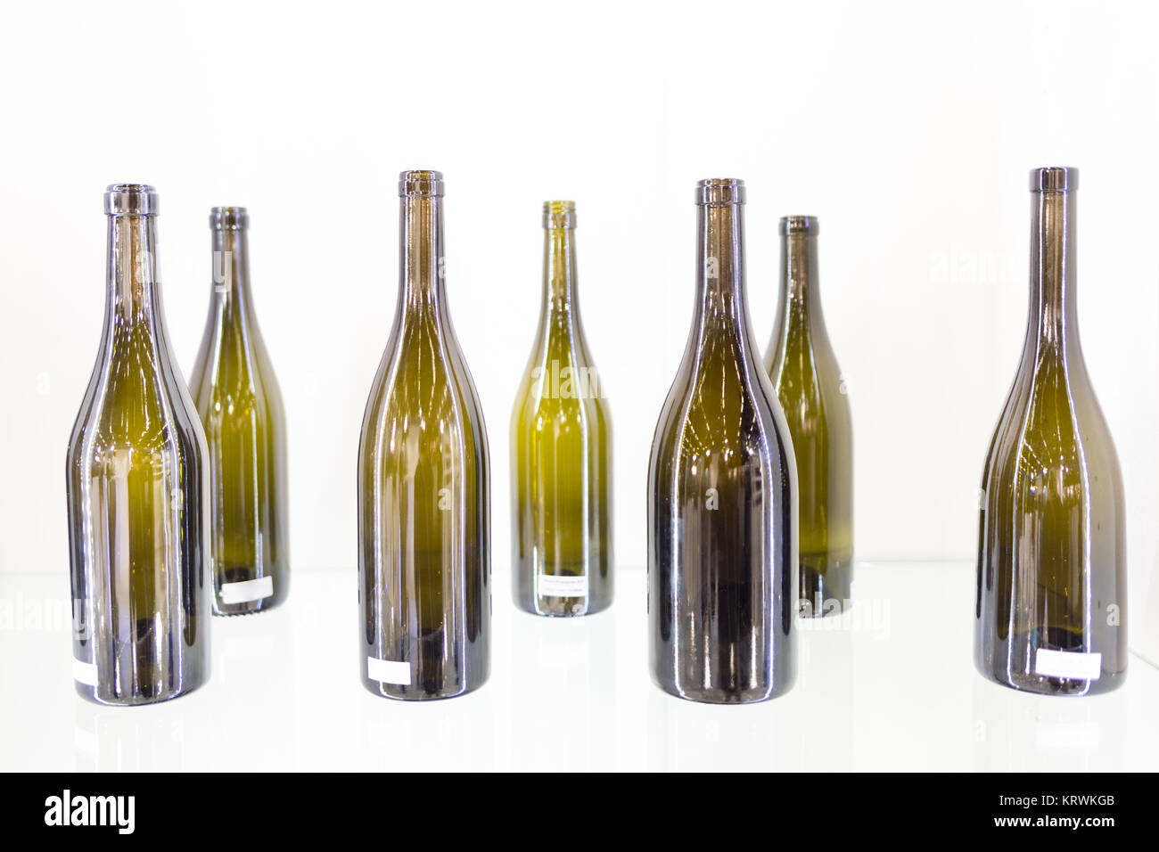 Empty bottle of wine on a white background Stock Photo - Alamy