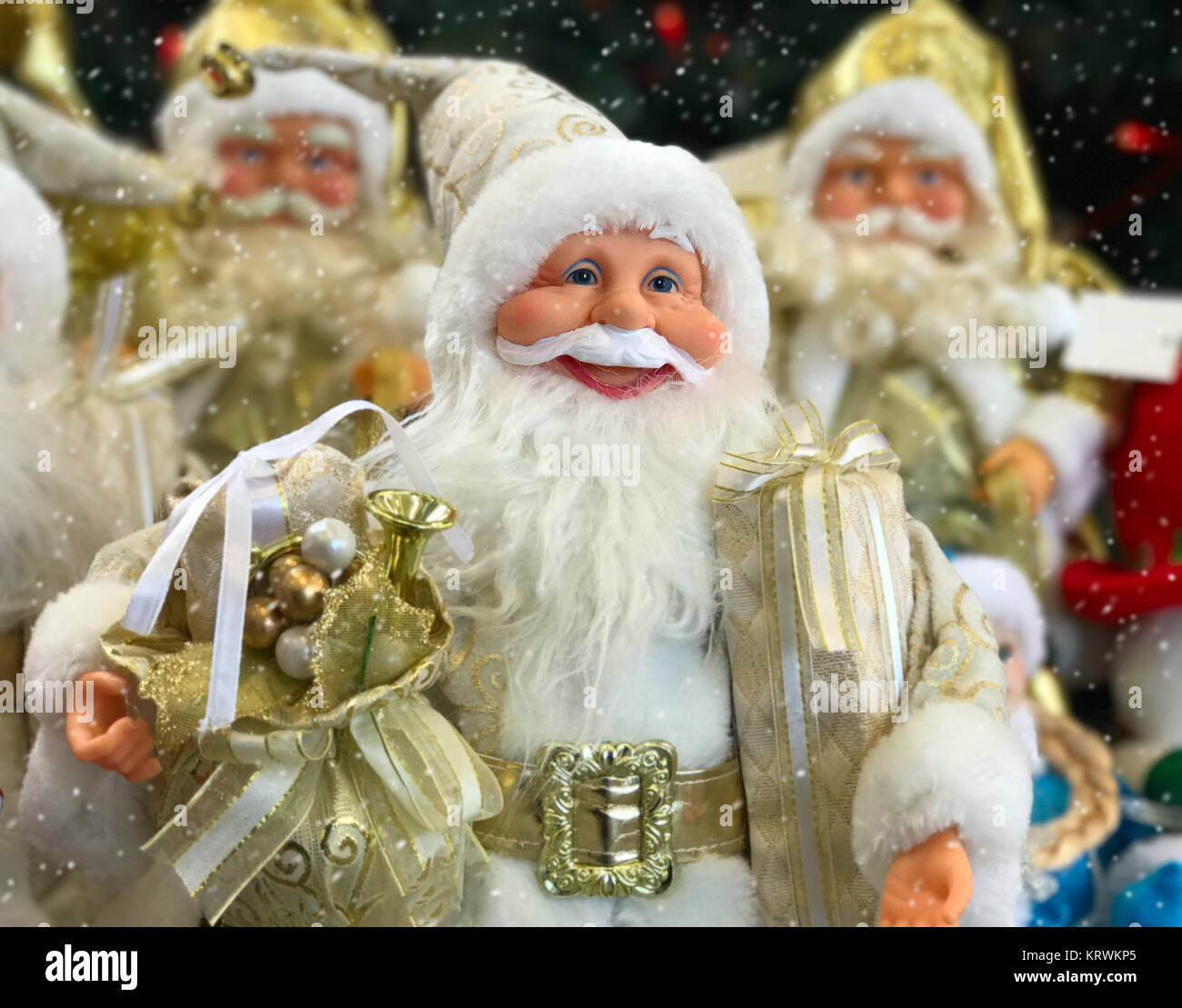 group of Santa Clauses with gifts Stock Photo - Alamy