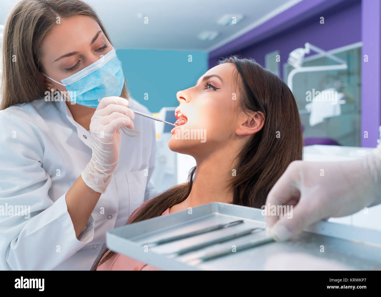 Doctor talking with her patient. Dentist concept Stock Photo - Alamy