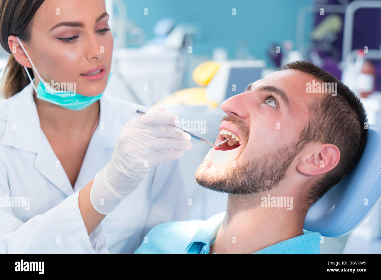 Doctor talking with her patient. Dentist concept Stock Photo - Alamy