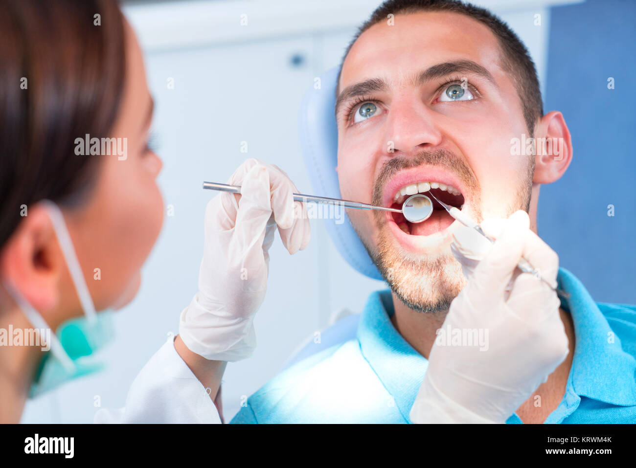 Doctor talking with her patient. Dentist concept Stock Photo - Alamy