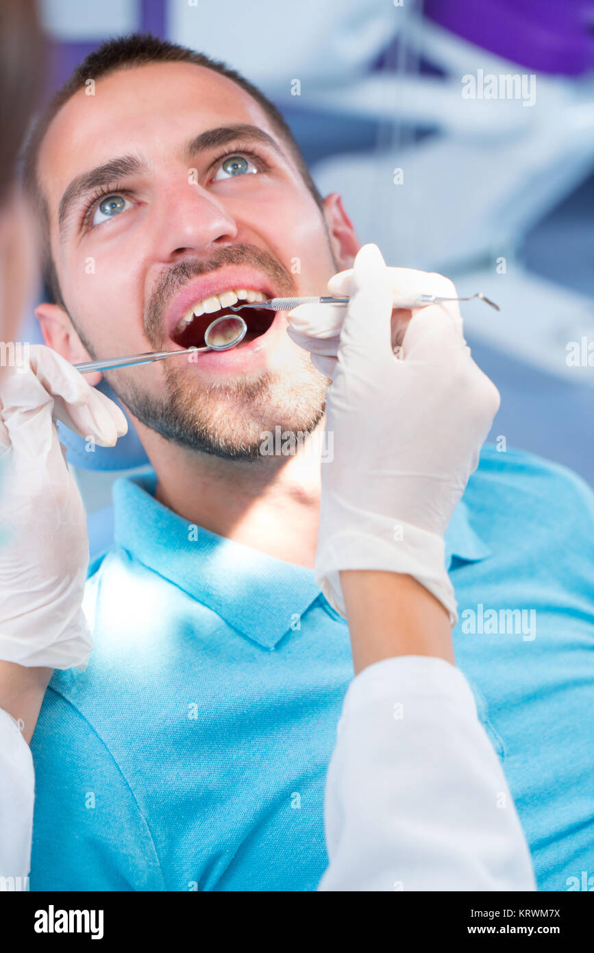 Doctor talking with her patient. Dentist concept Stock Photo - Alamy