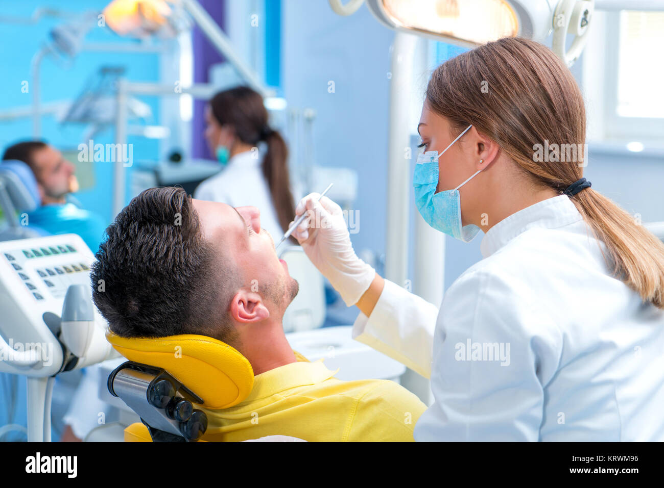 Doctor talking with her patient. Dentist concept Stock Photo - Alamy