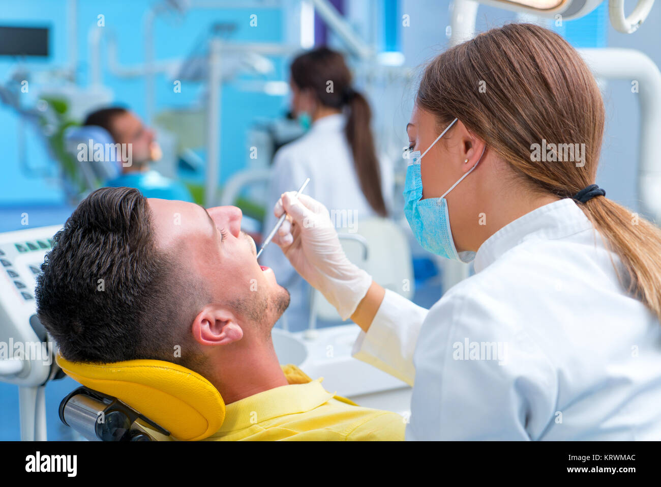 Doctor talking with her patient. Dentist concept Stock Photo - Alamy
