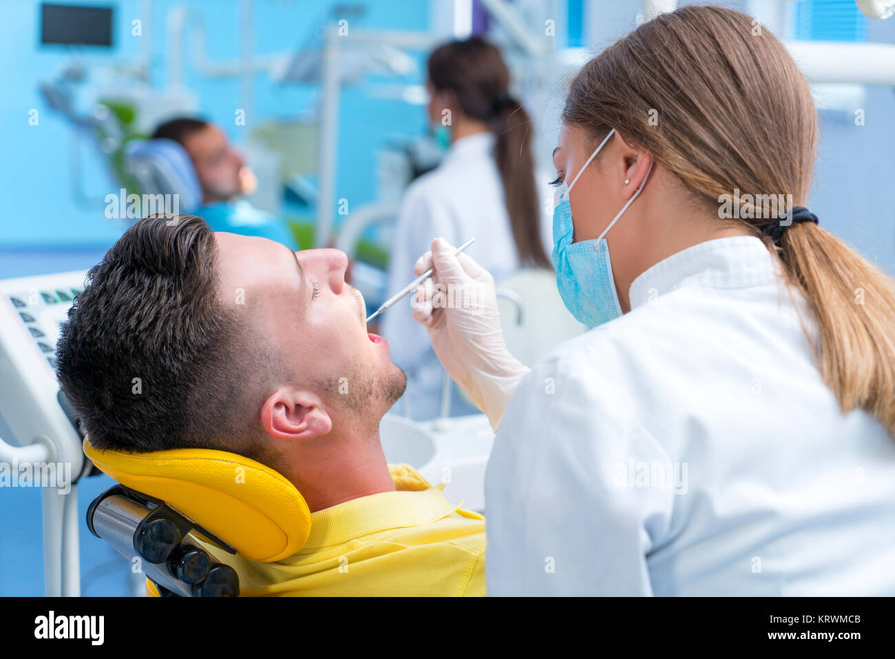 Doctor talking with her patient. Dentist concept Stock Photo - Alamy