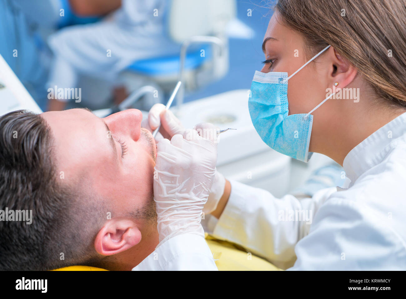 Doctor talking with her patient. Dentist concept Stock Photo - Alamy