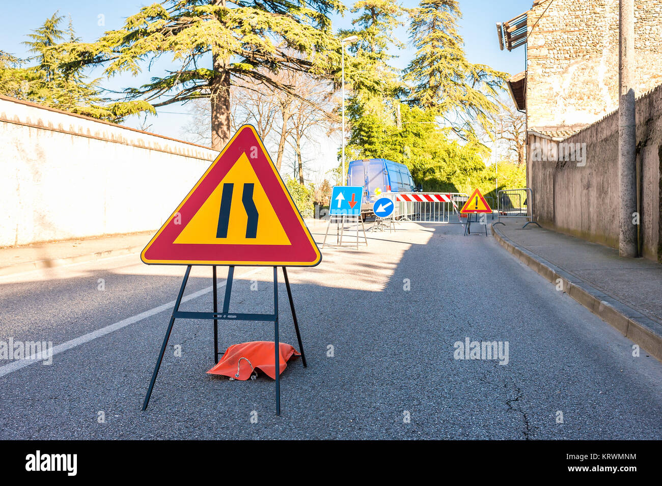 Road sign lane narrowing Stock Photo - Alamy