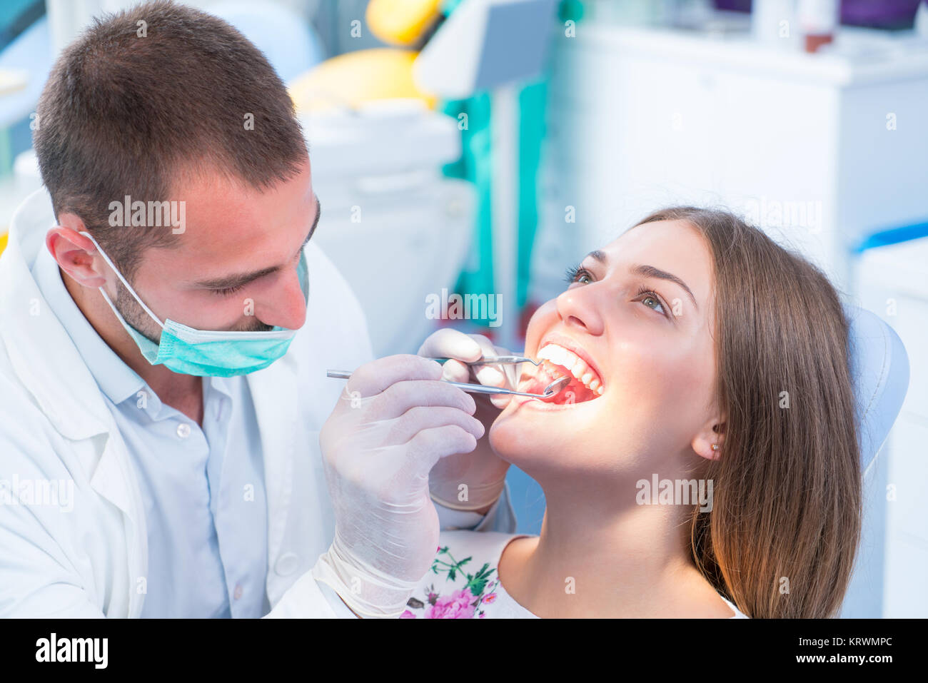 Doctor talking with her patient. Dentist concept Stock Photo - Alamy