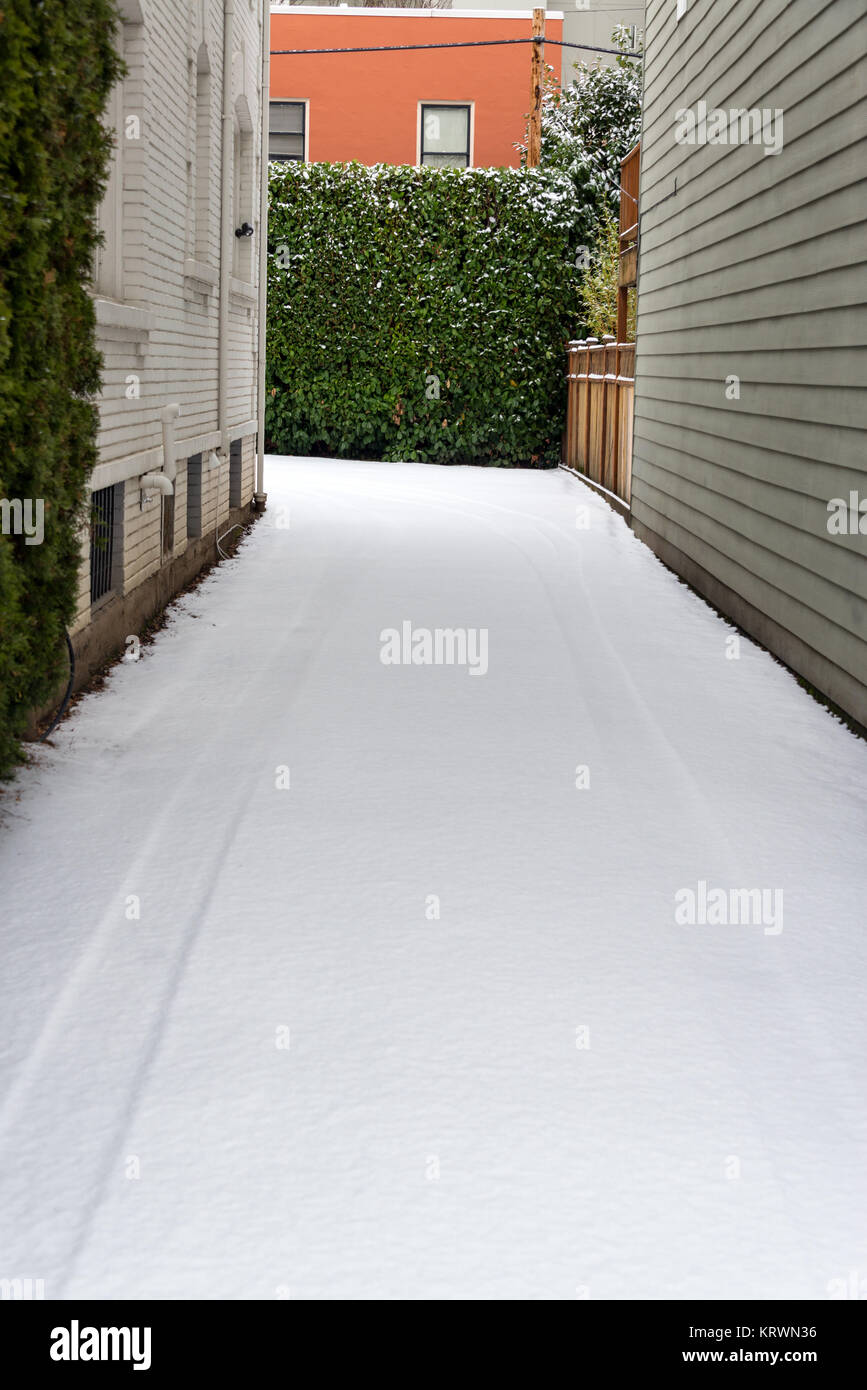 Snow Covered Alley Stock Photo - Alamy