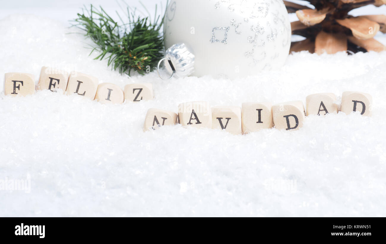 Feliz Navidad in snow, Spanish Christmas background with the words ...
