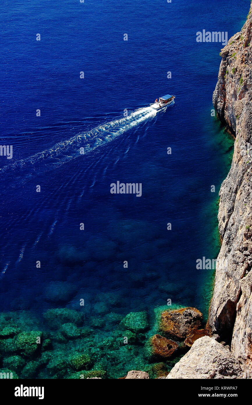 cliff view with boat Stock Photo - Alamy
