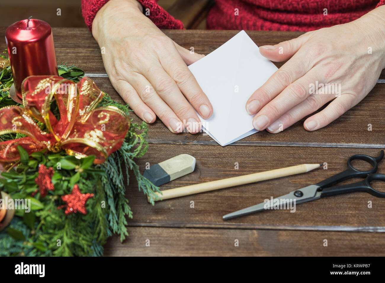 Folding paper tree on wooden desk Stock Photo - Alamy