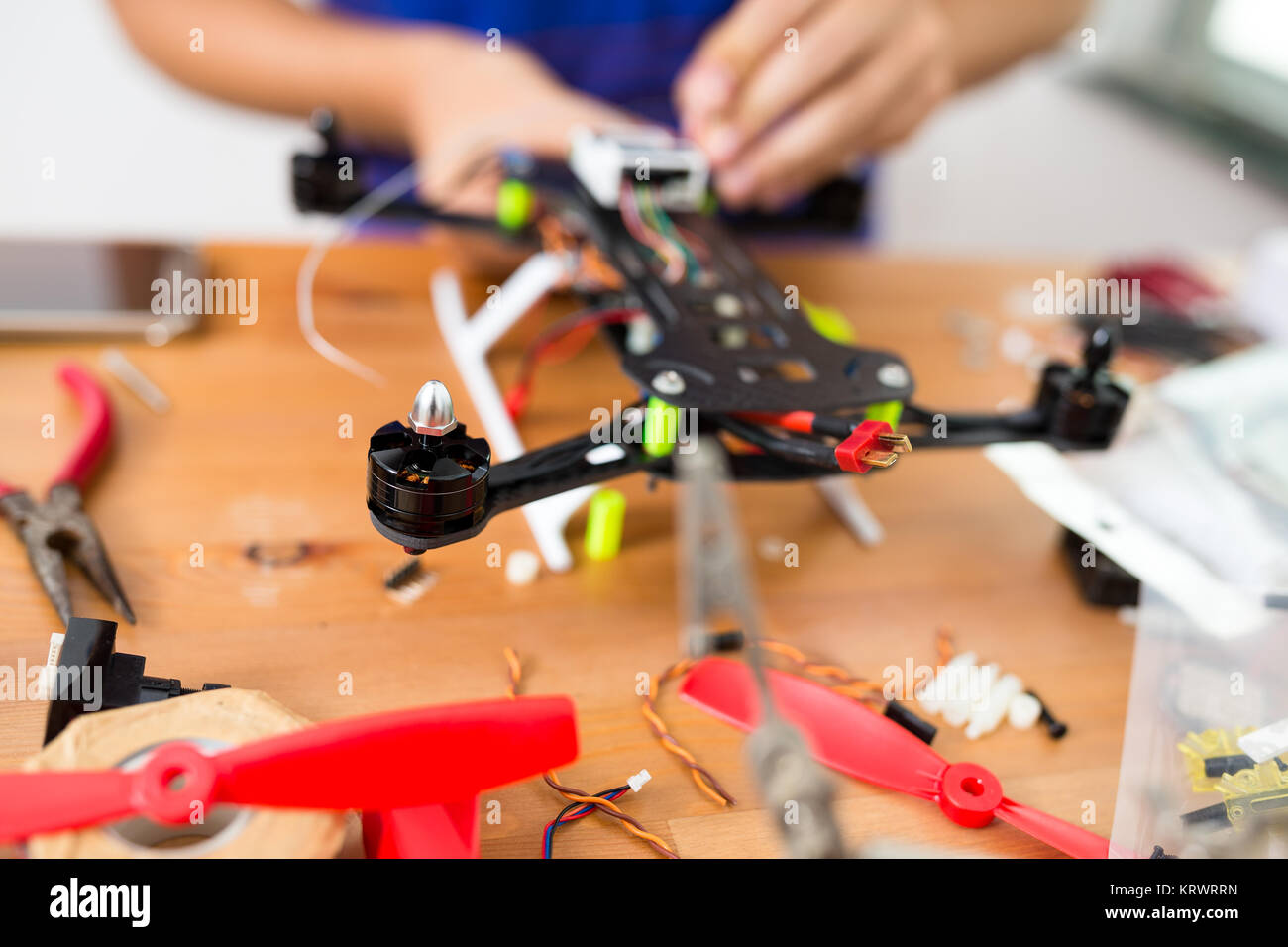 Connecting the component on drone at home Stock Photo - Alamy