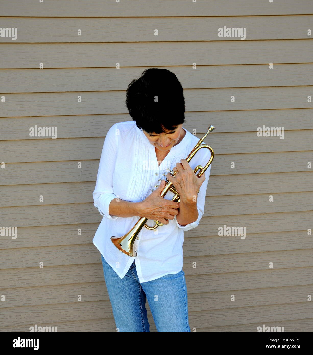Female trumpet player Stock Photo - Alamy