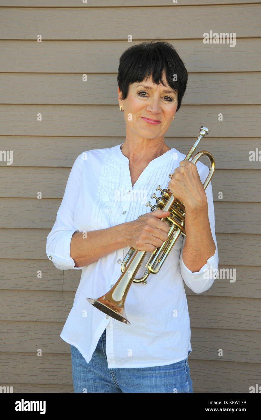 Female trumpet player Stock Photo - Alamy