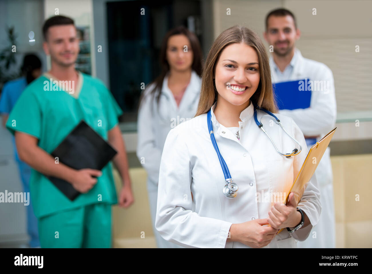 clinic, profession, people, health care and medicine concept - happy ...