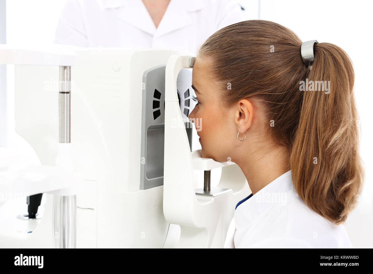 eye examination. a woman in an ophthalmic office. computer eye ...