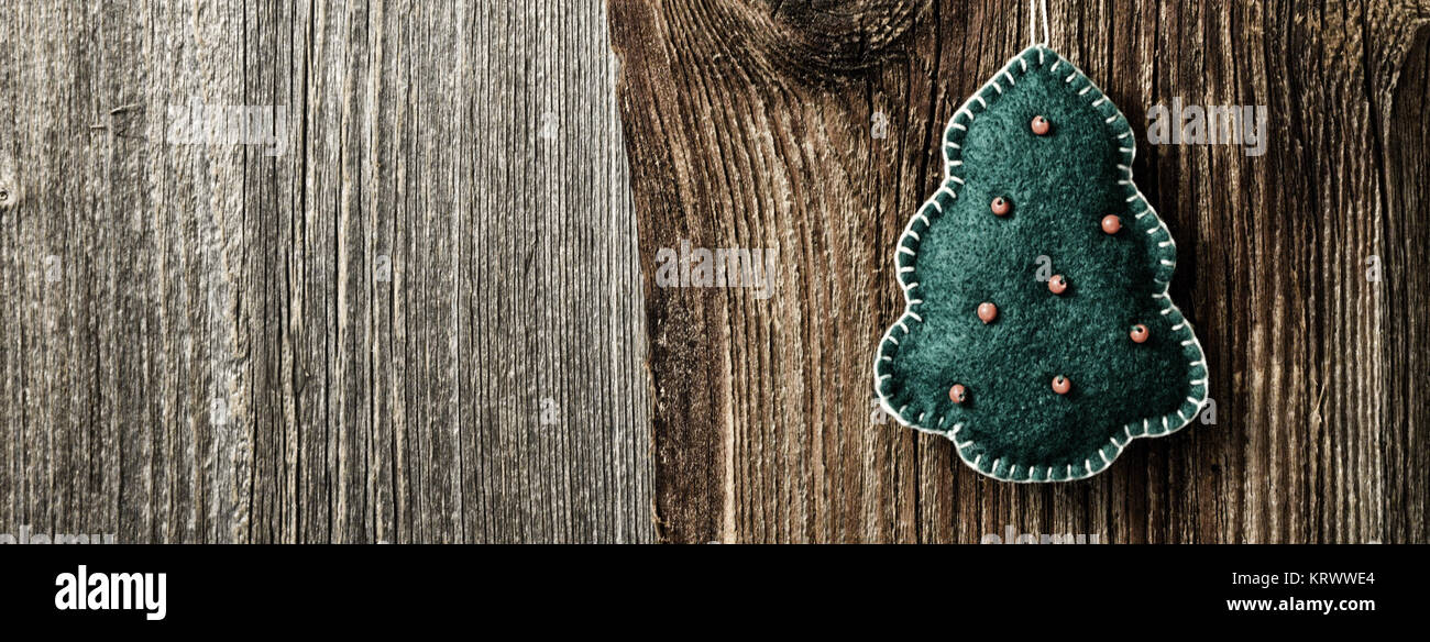 Weihnachten Holzhintergrund mit Baum und Stiefel Banner Stock Photo - Alamy