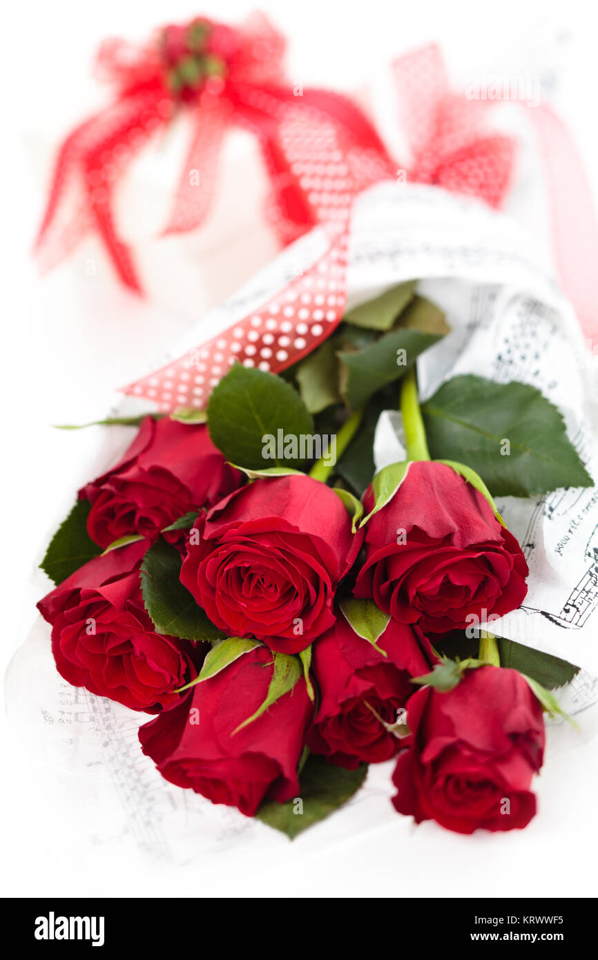 Roses and gift Stock Photo - Alamy