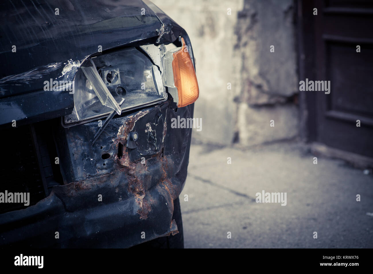 Crashed car headlight detail Stock Photo - Alamy