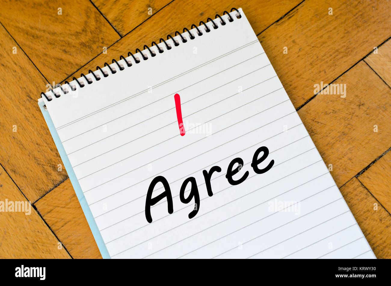 I agree concept on notebook Stock Photo - Alamy