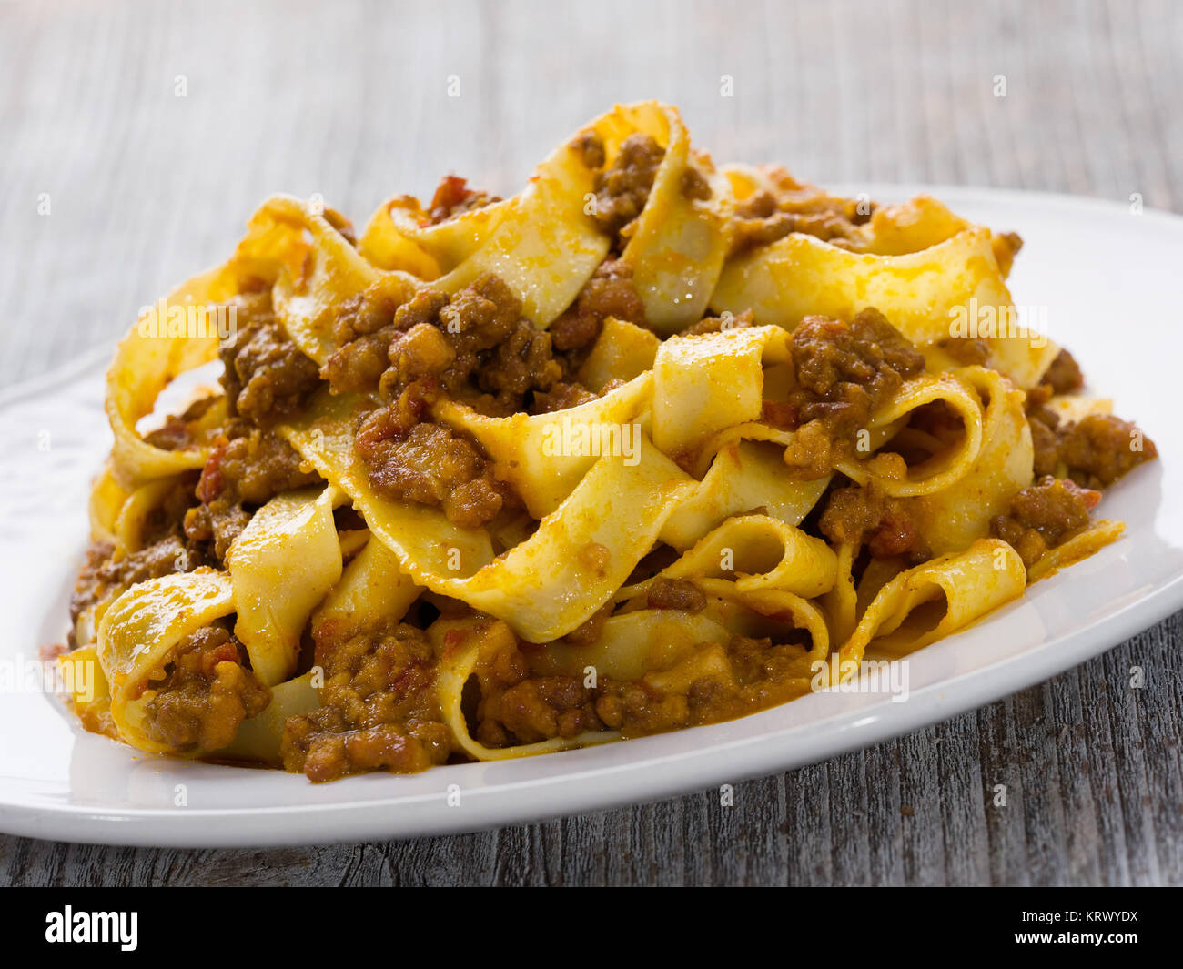 rustic traditional italian pappardelle bolognese Stock Photo - Alamy