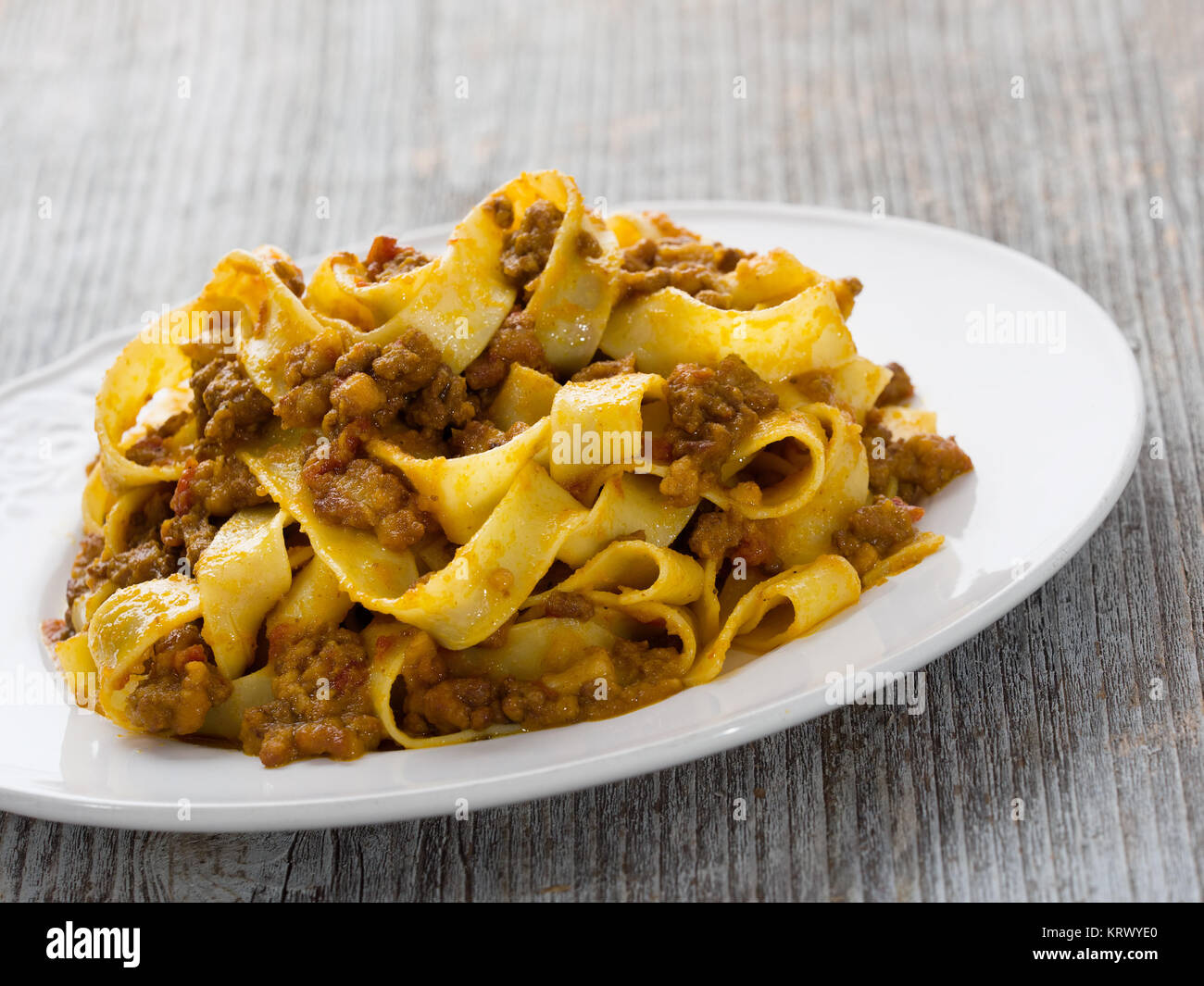 rustic traditional italian pappardelle bolognese Stock Photo - Alamy
