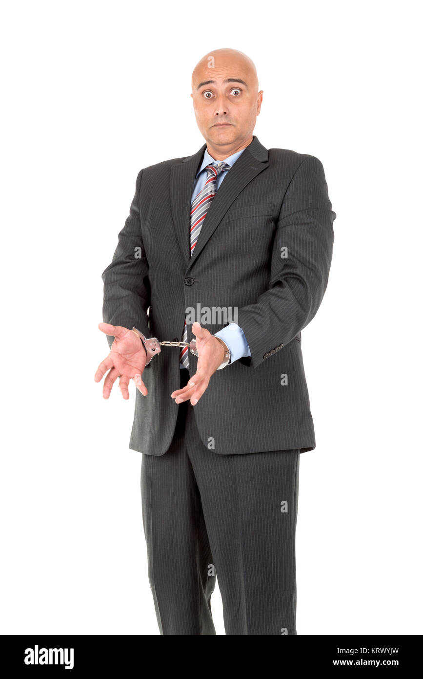 Businessman in handcuffs Stock Photo - Alamy