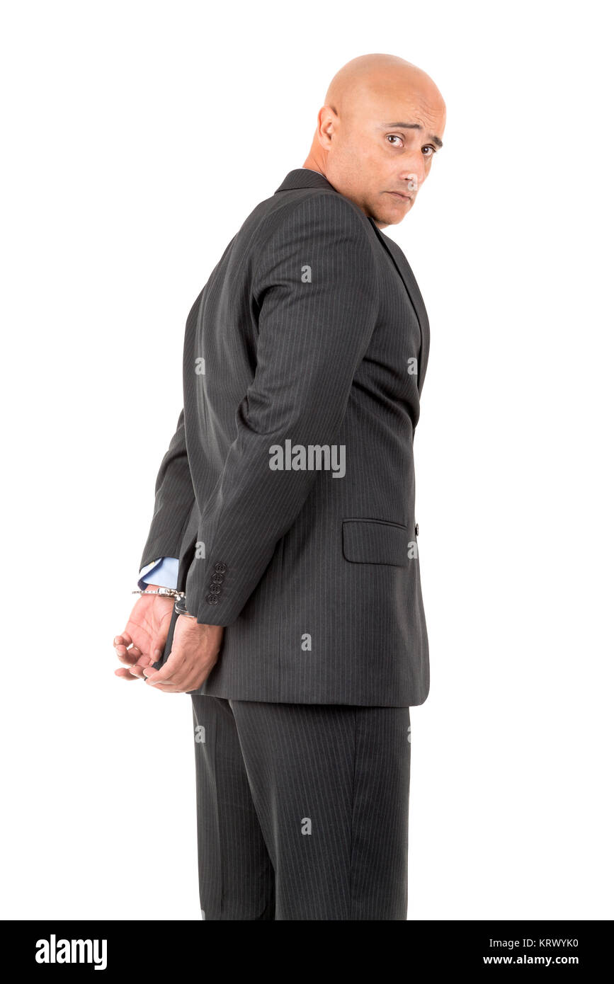 Businessman in handcuffs Stock Photo - Alamy