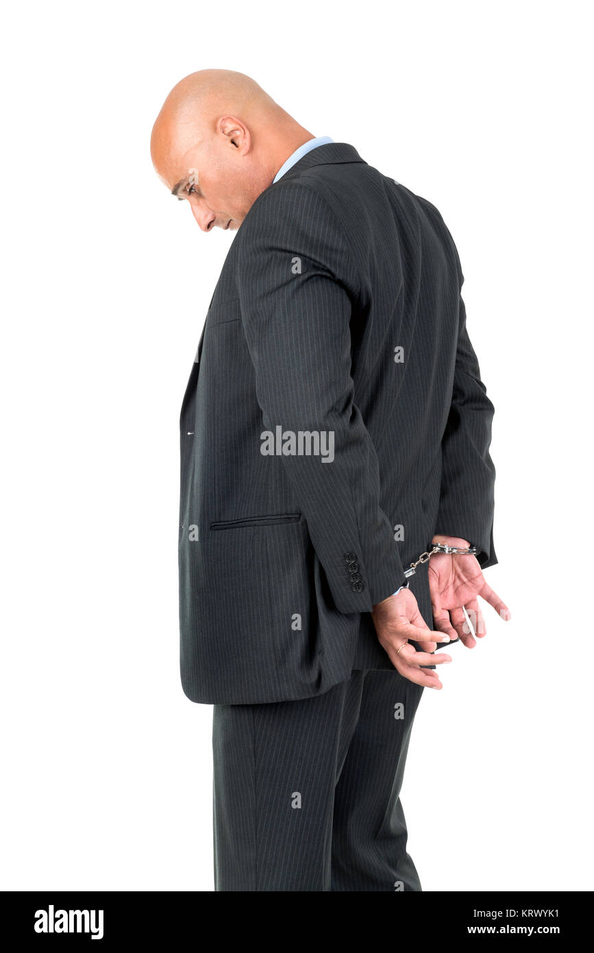 Businessman in handcuffs Stock Photo - Alamy