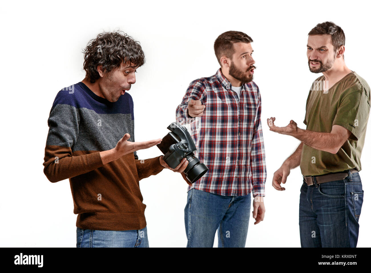 Friends with camera on white Stock Photo - Alamy